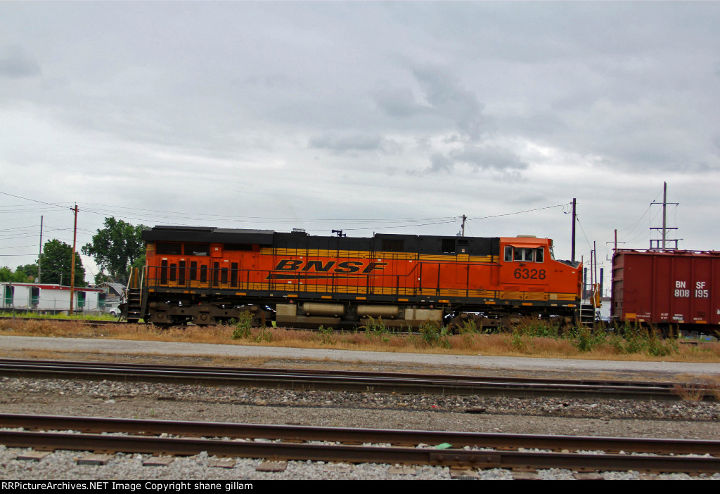 BNSF 6328 Shoves Dpu on a oil can,